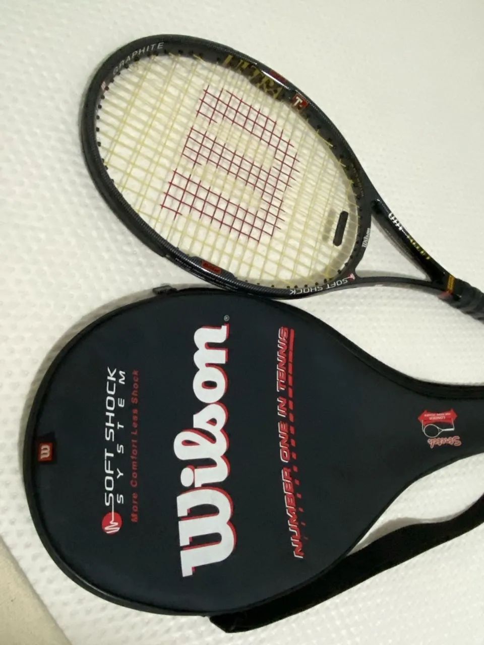 Raquete de Tênis Wilson Soft Shock Graphite - Esportes de Quadra e Ao ...