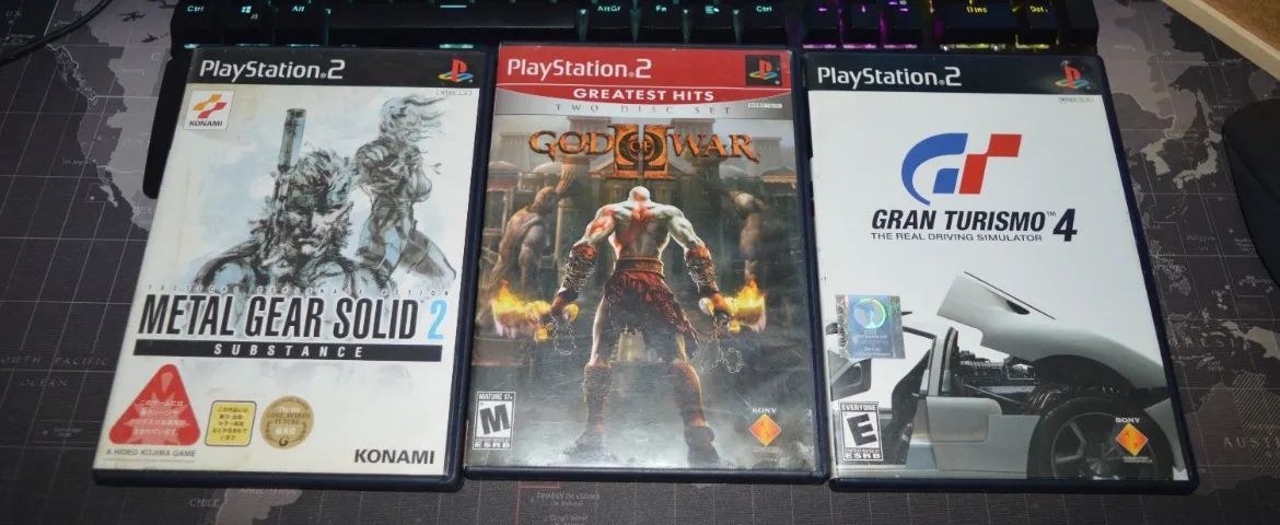 Combo de Games PlayStation 2 - God of War II, Gran Turismo 4 e Metal ...