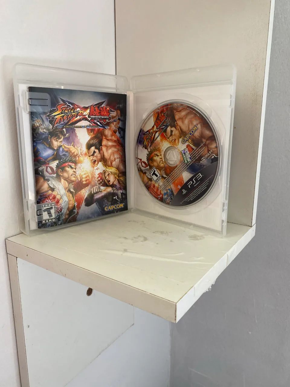 Ps3 super slim usado com uma coleção de jogos : GTA V, STREET X TEKKEN ...