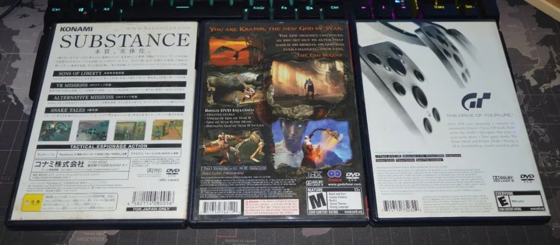 Combo de Games PlayStation 2 - God of War II, Gran Turismo 4 e Metal ...