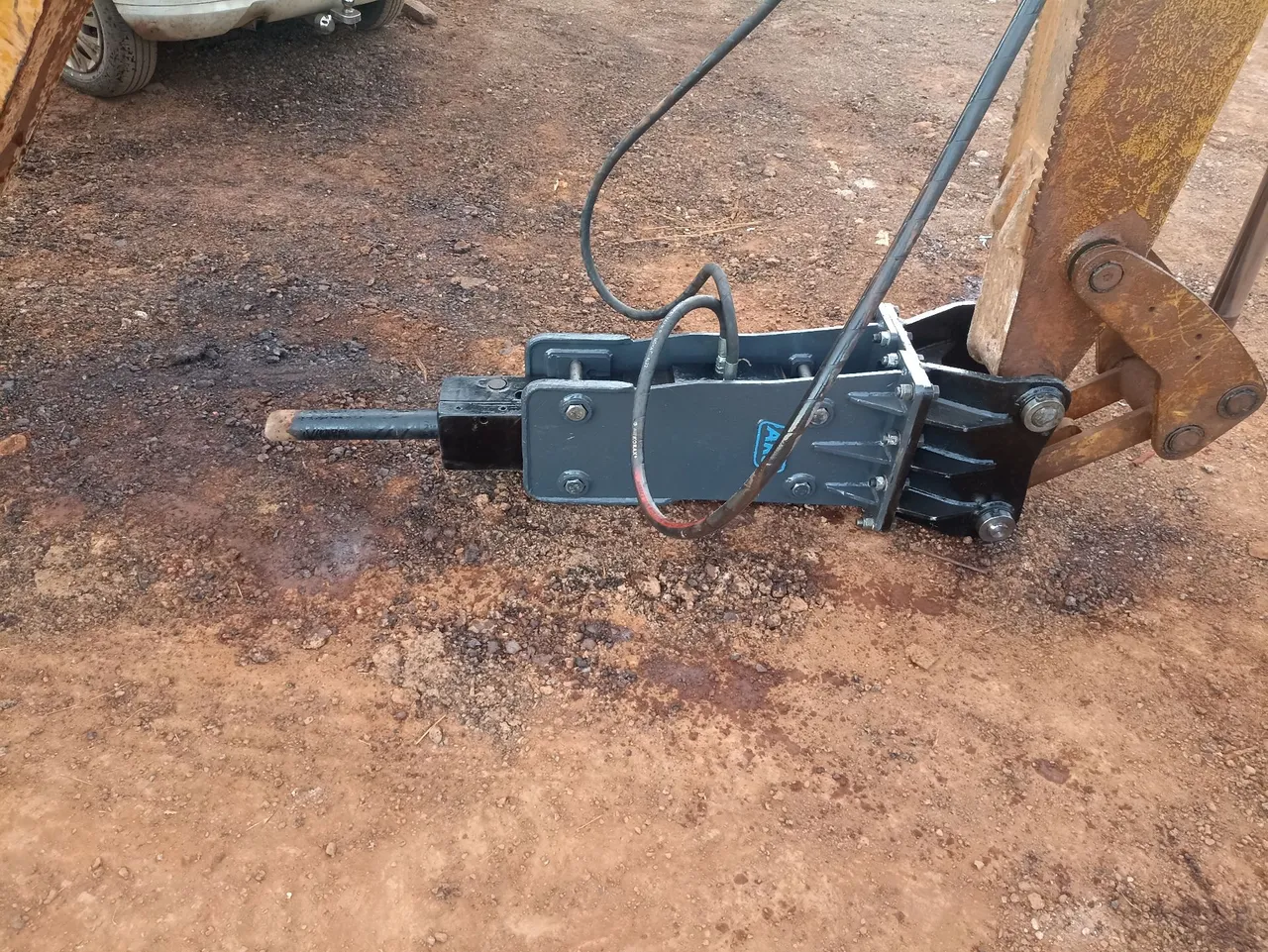 "retroescavadeira com rompedor" - Máquinas pesadas para construção no ...