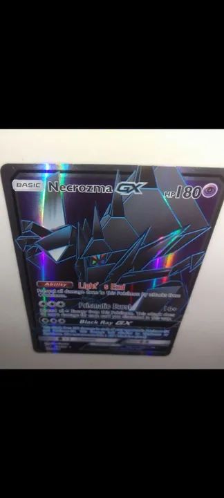 Carta Pokémon Necrozma GX - Black Ray GX cromada holográfica - Livros e ...