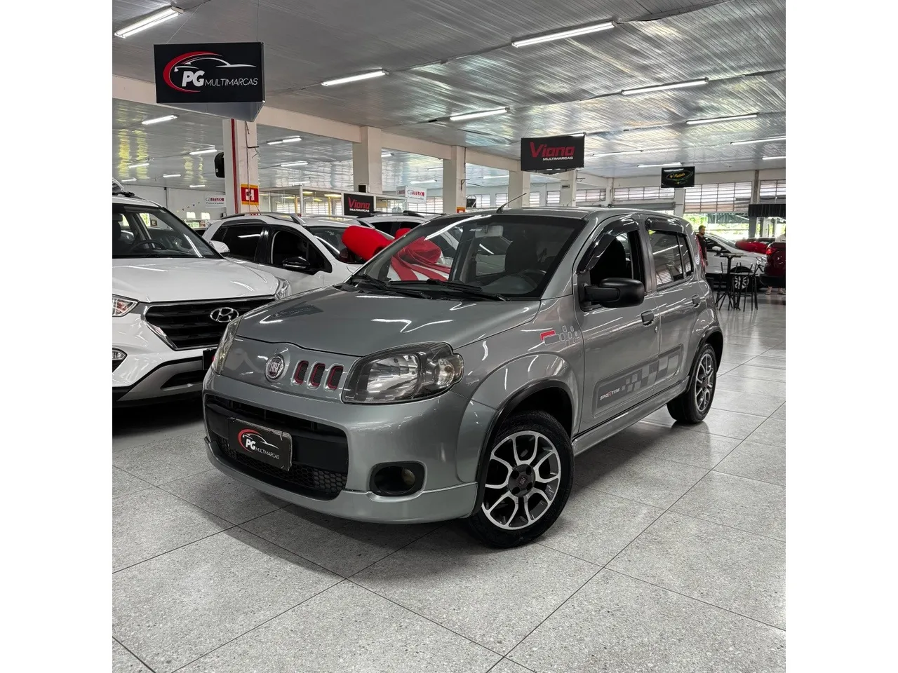 Fiat Uno SPORTING 1.4 EVO FIRE FLEX 8V 4P Usados e Novos
