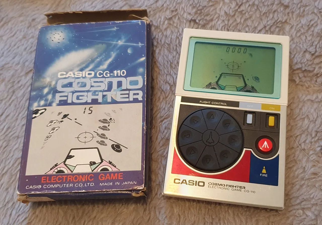 Casio CG 110 - Cosmo Fighter de 1982 com caixa e manual original ...