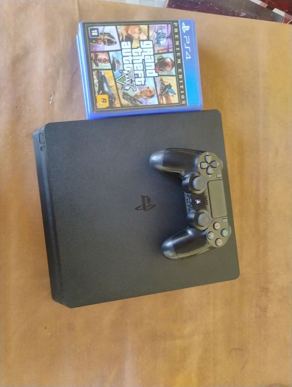 PlayStation 4 semi novo com GTA 5 e call of duty god of war - Consoles ...