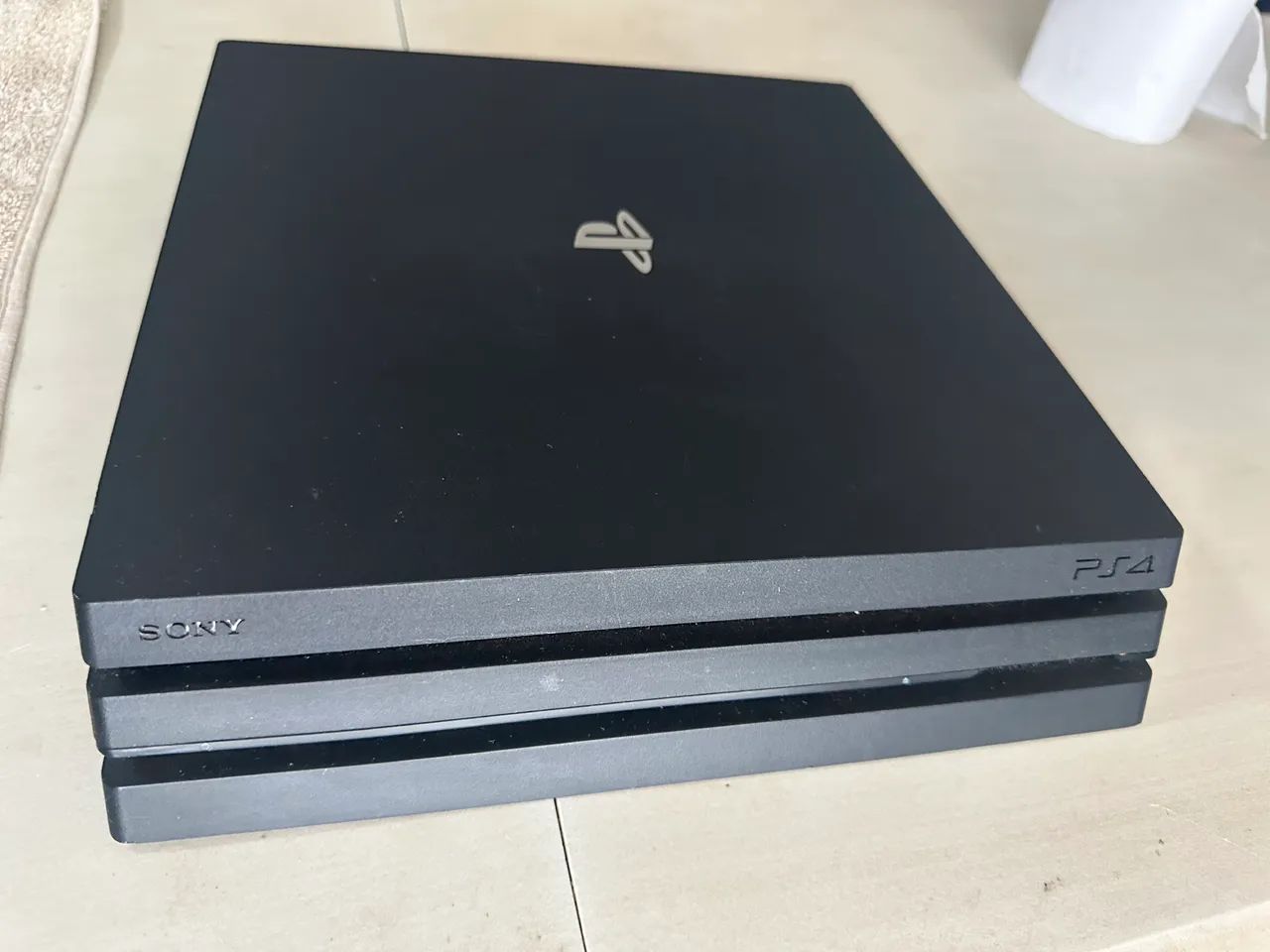 Ps4 Pro 1tb 4 controles 4 jogos e base carregador GTA V Uncharted Call ...