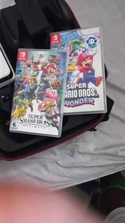Nintendo Switch Oled e jogos - Super Mario Bros. Wonder e Super Smash Bros. Ultimate - Consoles ...