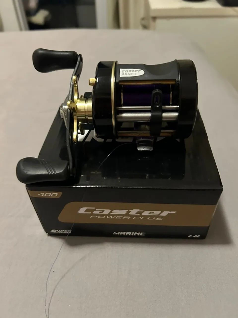 Carretilha Caster 400 Power Plus - Semi-nova + Linha Mono - Esportes ...