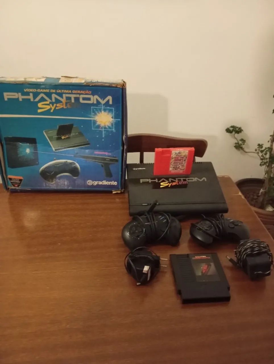 Phantom System na caixa, com jogo original e mais cartucho com 130 jogos. - Consoles de Vídeo ...