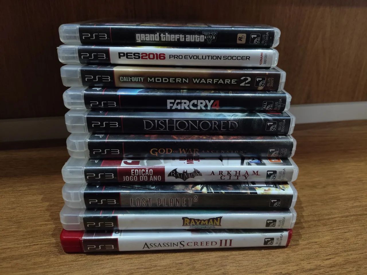 PS3 slim + 10 jogos originais ( GTA V, God Of War,Batman e ...