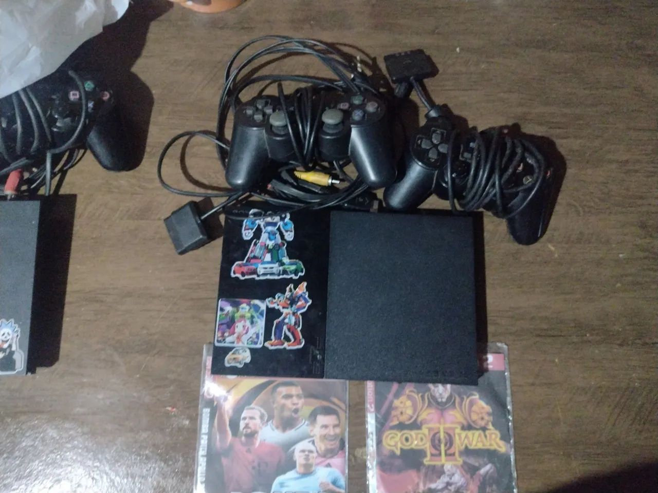 Dóis PS2 funcionando bem cada um com dóis controles cabos e jogos ...