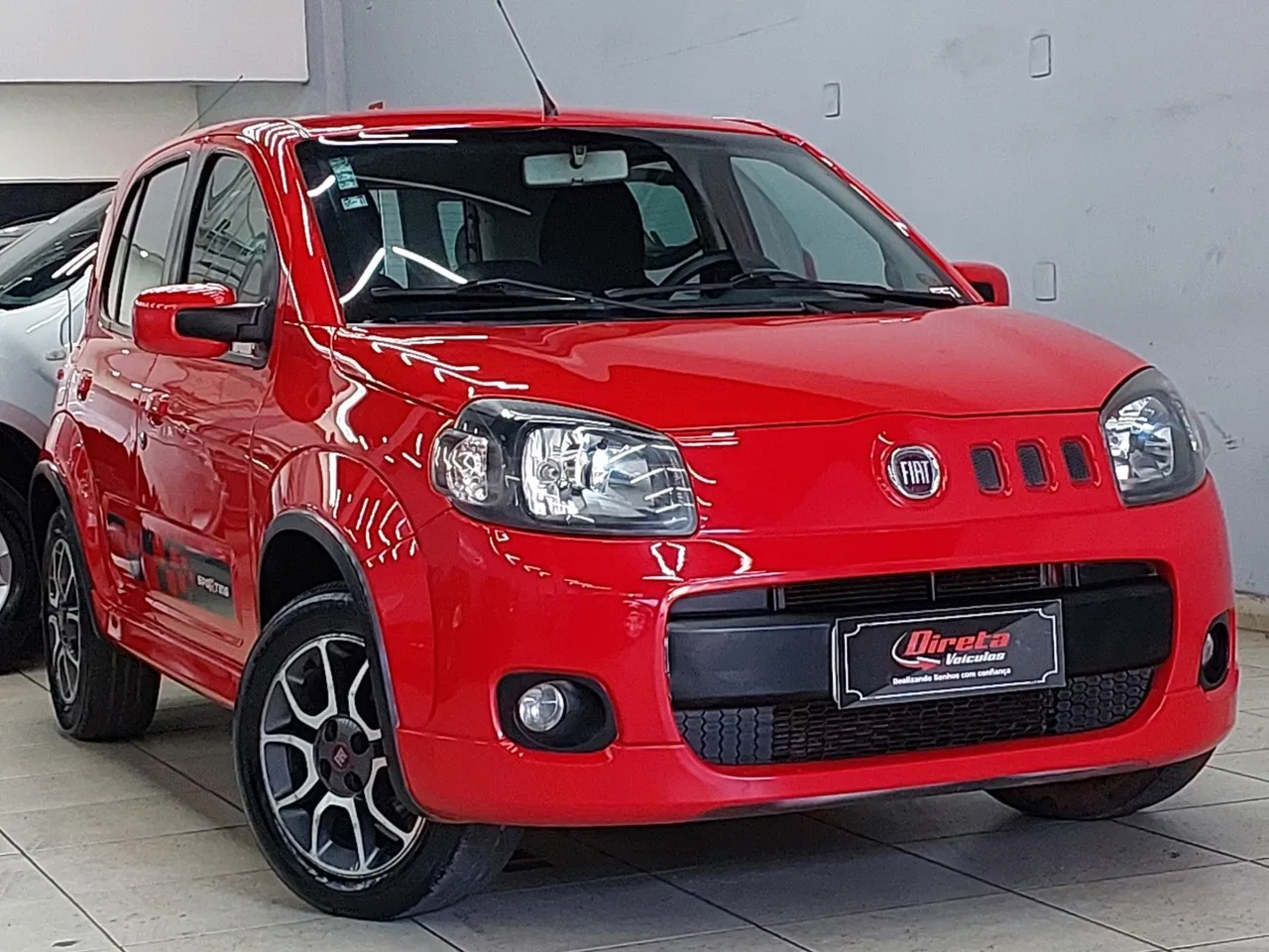 Fiat Uno SPORTING 1.4 EVO FIRE FLEX 8V 4P Usados e Novos