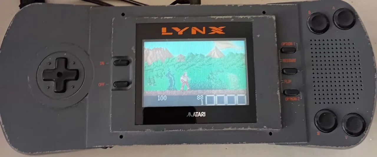 Atari lynx primeiro modelo com rygar e fonte - Peças e Acessórios de ...