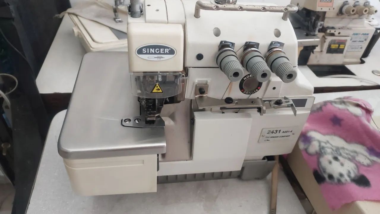 Máquina de Costura Singer overlock industrial seminova - Equipamentos ...